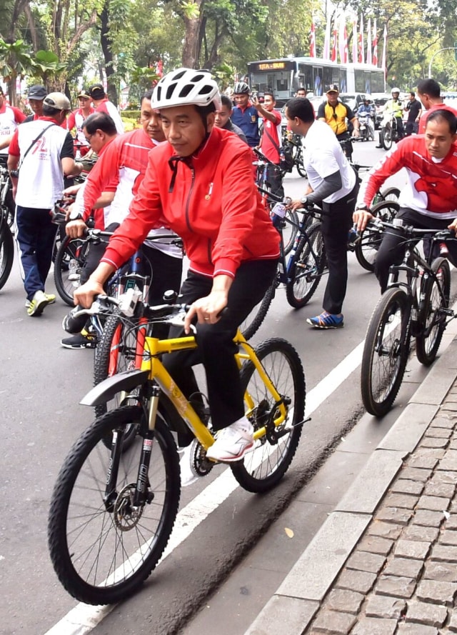 Sepeda Kuning Jokowi dan Sertifikat Tanah Balai Kota Jakarta | kumparan.com