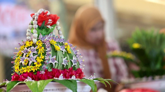 Foto: Menjaga Tradisi Aceh Lewat Lomba Merangkai Sirih | kumparan.com