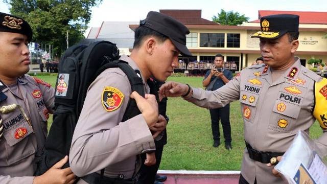 Polda Sulut Lepas 1.945 Personel BKO yang Bertugas untuk Pengamanan Pemilu 2024 | kumparan.com